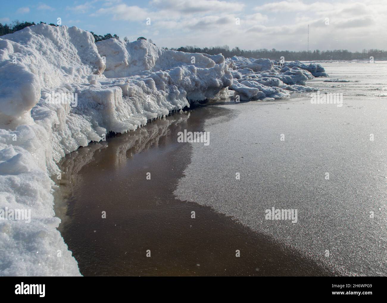 winter landscape by the sea, snowy, interesting ice shapes on the sea ...