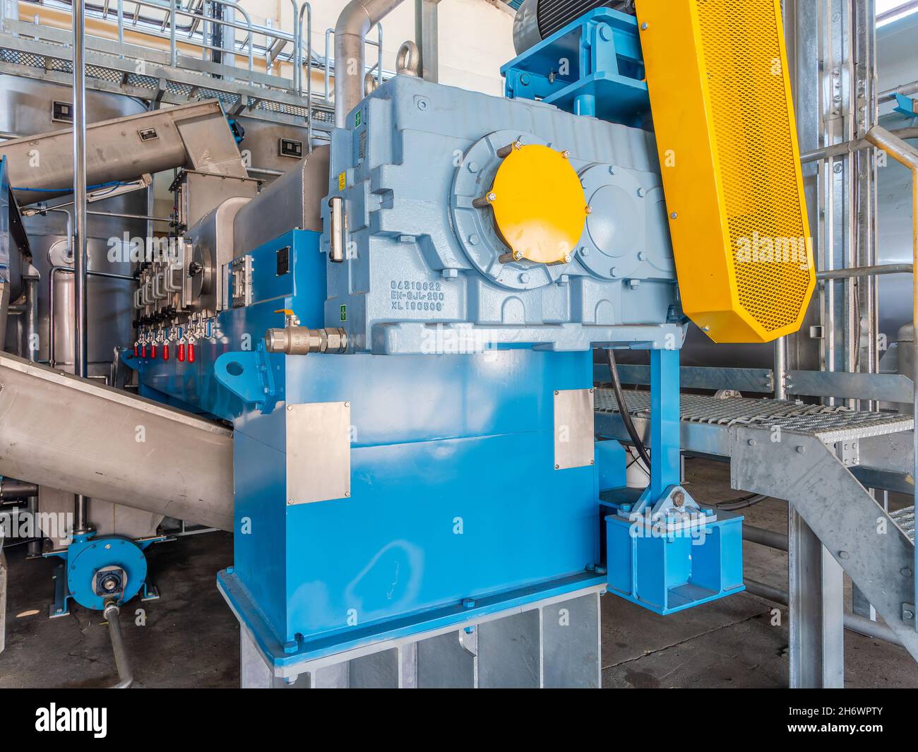 Twin screw press at fish meal plant. The plant processes byproducts ...