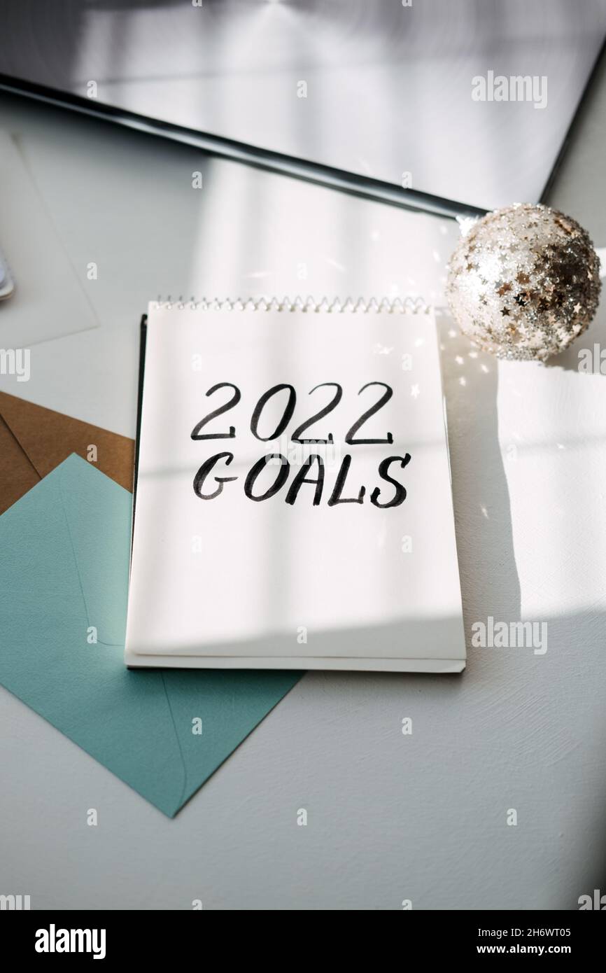 2022 goals, New year resolution. Text 2022 goals in open notepad on the ...