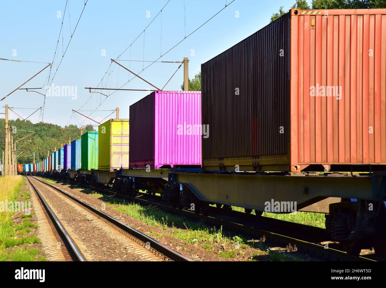 Cargo Containers Transportation On Freight Train By Railway. Intermodal ...