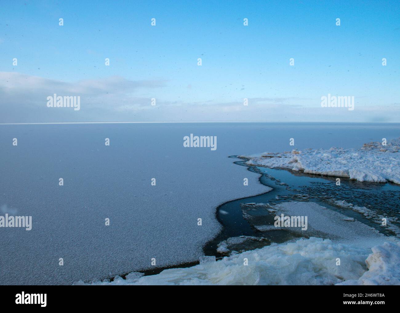 winter landscape by the sea, approaching snowfall, blurred snow ...