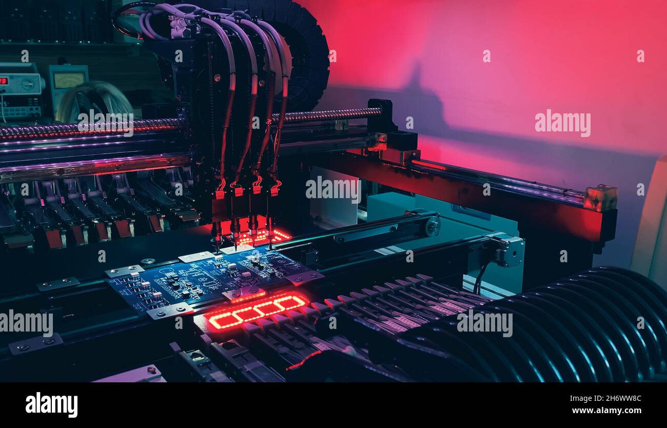 Automatic production of computer chips by SMT Pick and Place machine ...