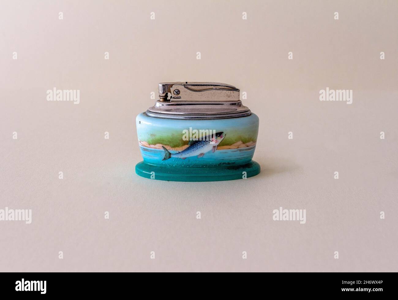 Decorative lighter in its own case Stock Photo - Alamy
