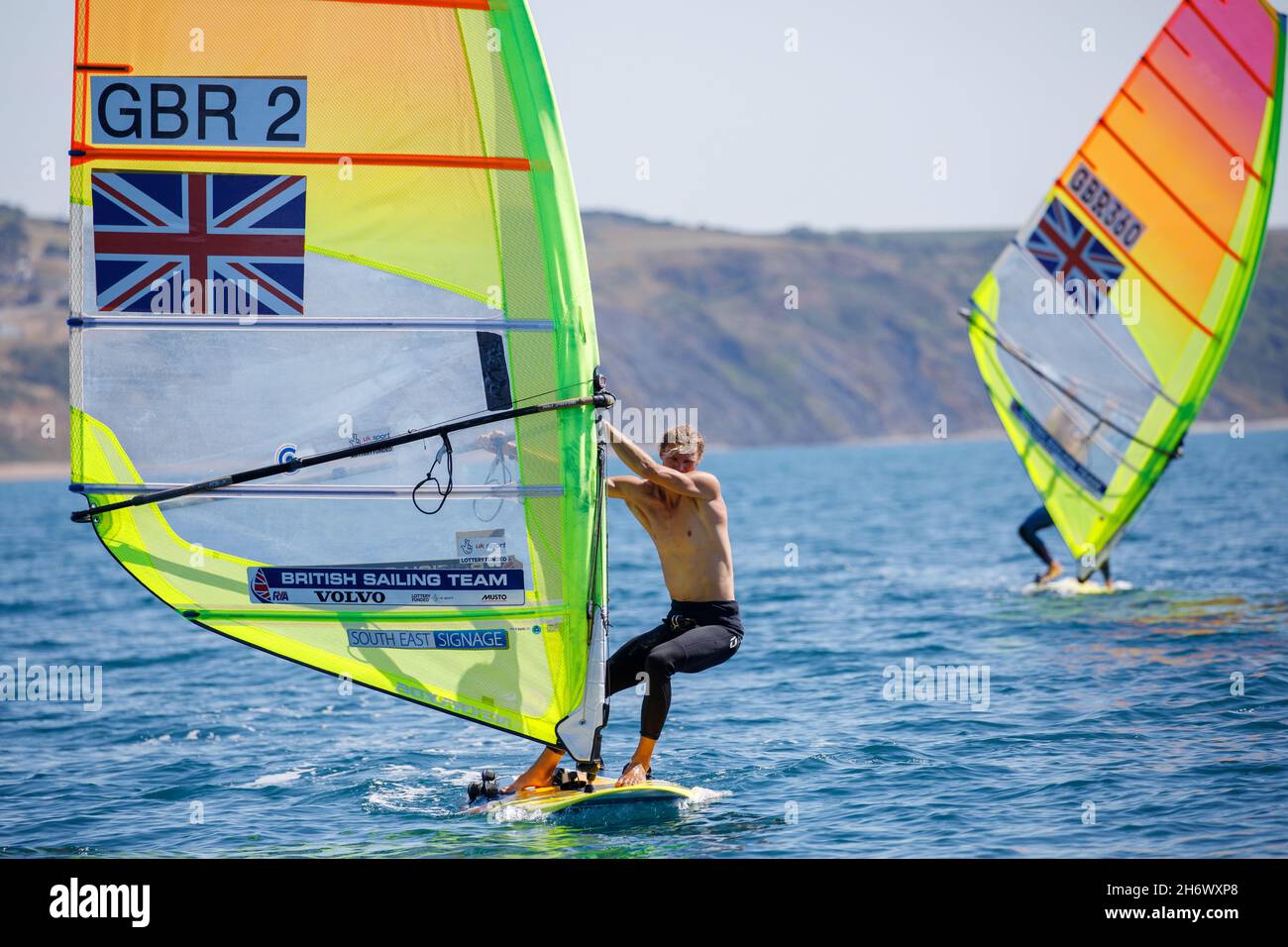 Tom Squires with training partner, Andy Brown (GBR) during a windsurf ...