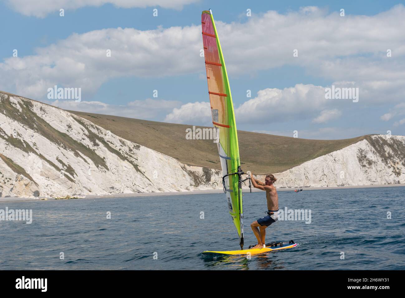 Tom Squires windsurfing near the white cliffs at Weymouth Bay on the ...