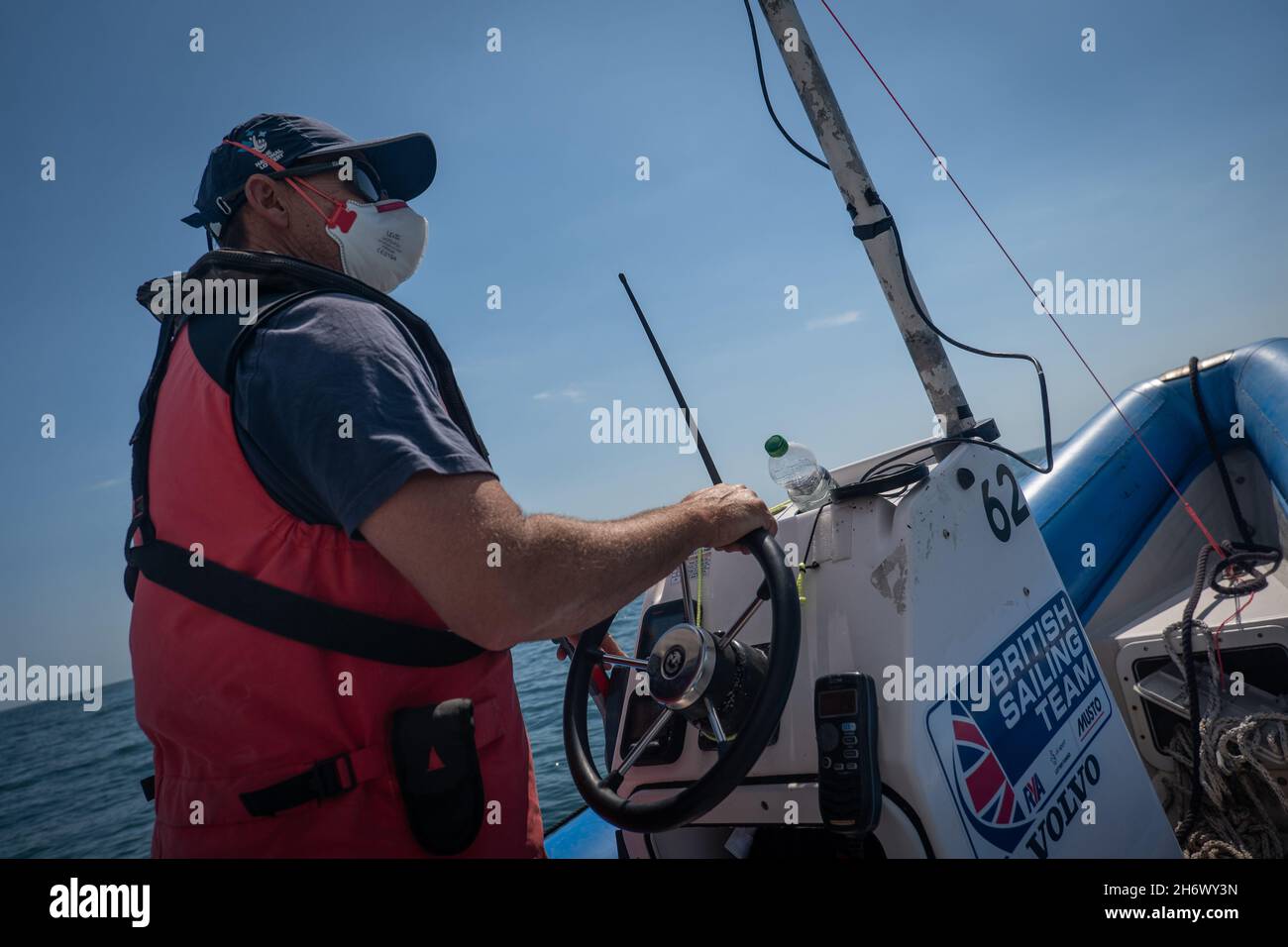 Windsurf coach, Dom Tidey, getting a RIB (Rigid Inflatable Boat) ready ...