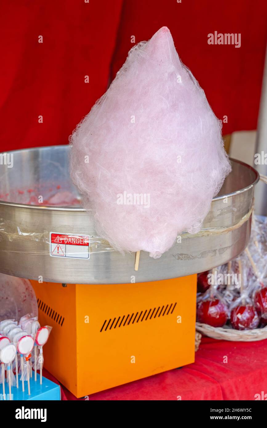 Candy Floss Sweets Machine at Fun Fair Stock Photo - Alamy