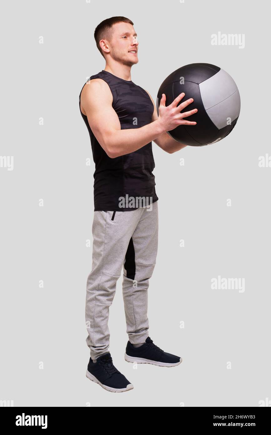 Sportsman with Medical Ball in Hands. Man Doing Workout with Medical ...
