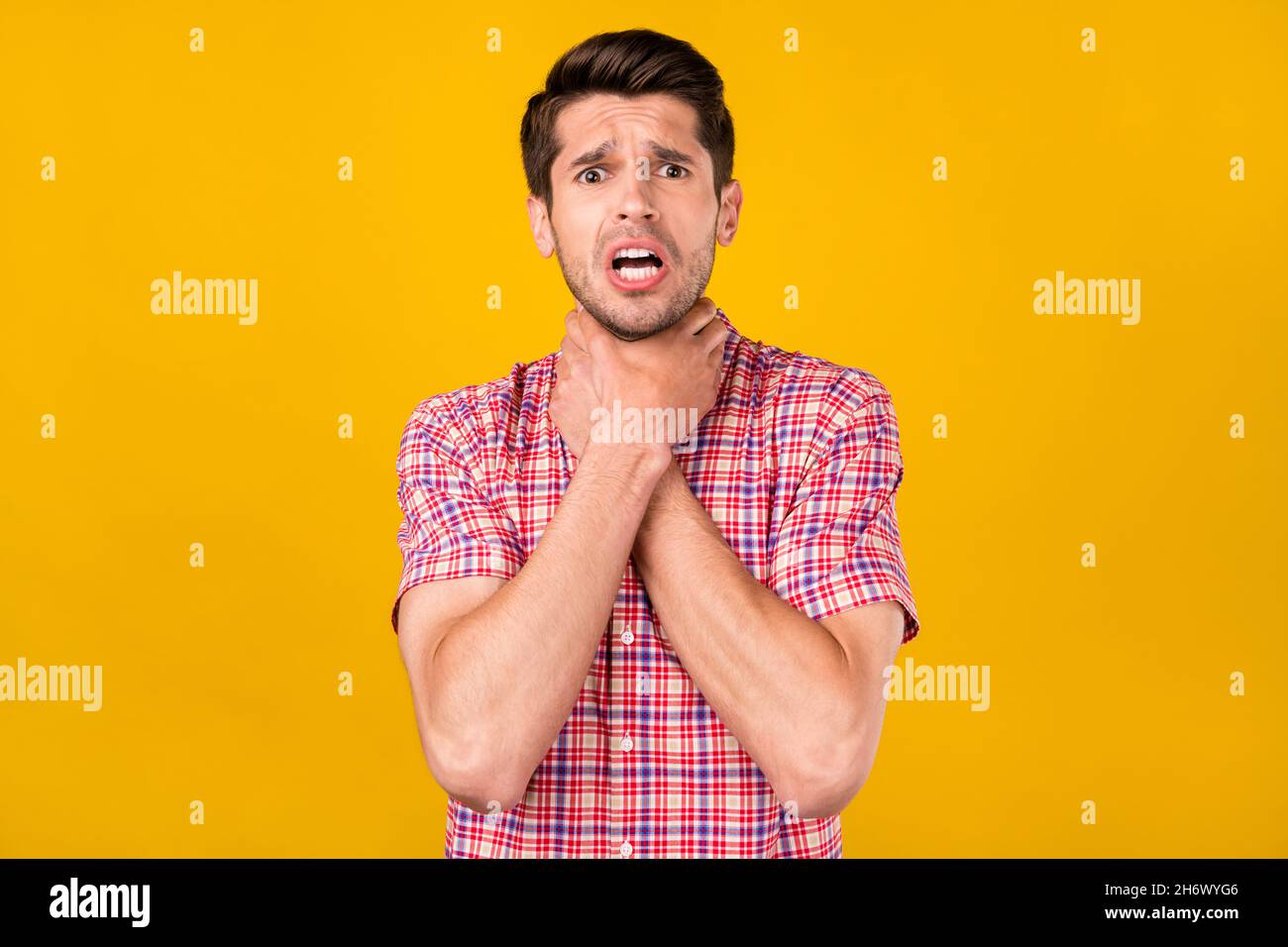Photo of young guy hands touch neck sick ill sore throat unhealthy ...