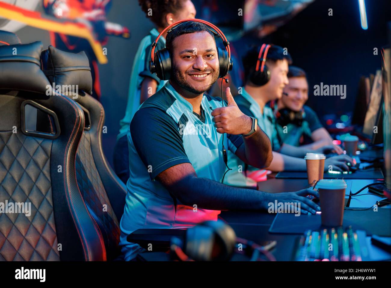 Professional gamer participating in esports tournament in gaming club ...