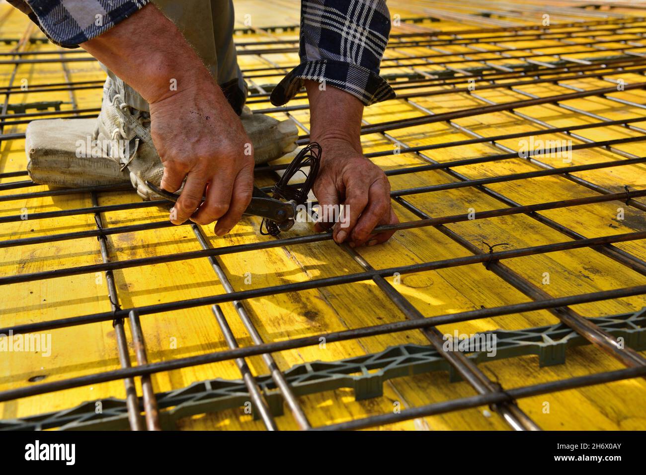 Handmade sheeting with iron pipe at construction site for concreting ...