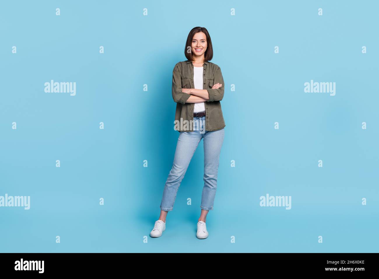 Full body photo of cool satisfied glad lady stand with folded arms wear ...
