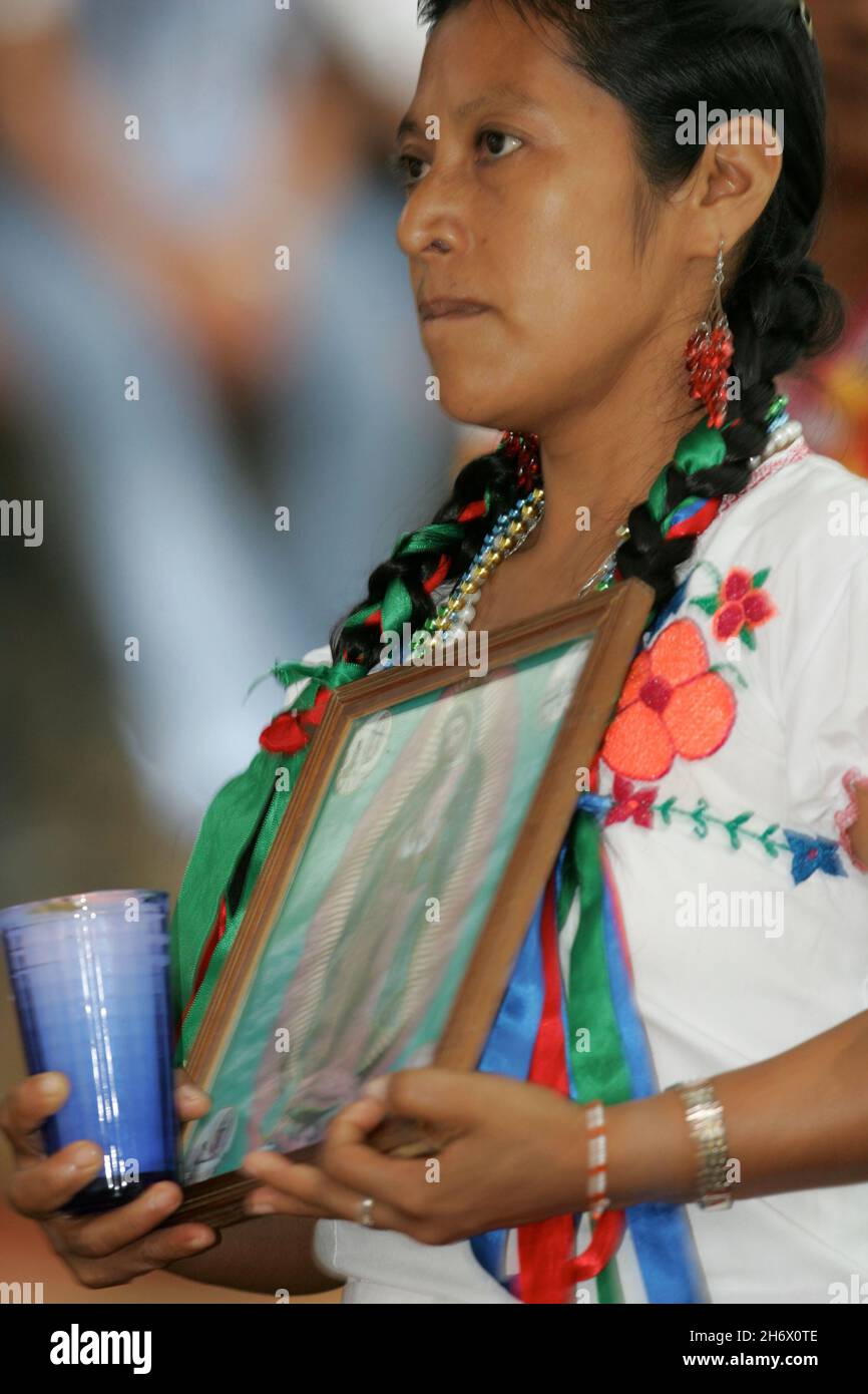 A woman from the Nahuatl indigenous group peforming a traditional dance ...