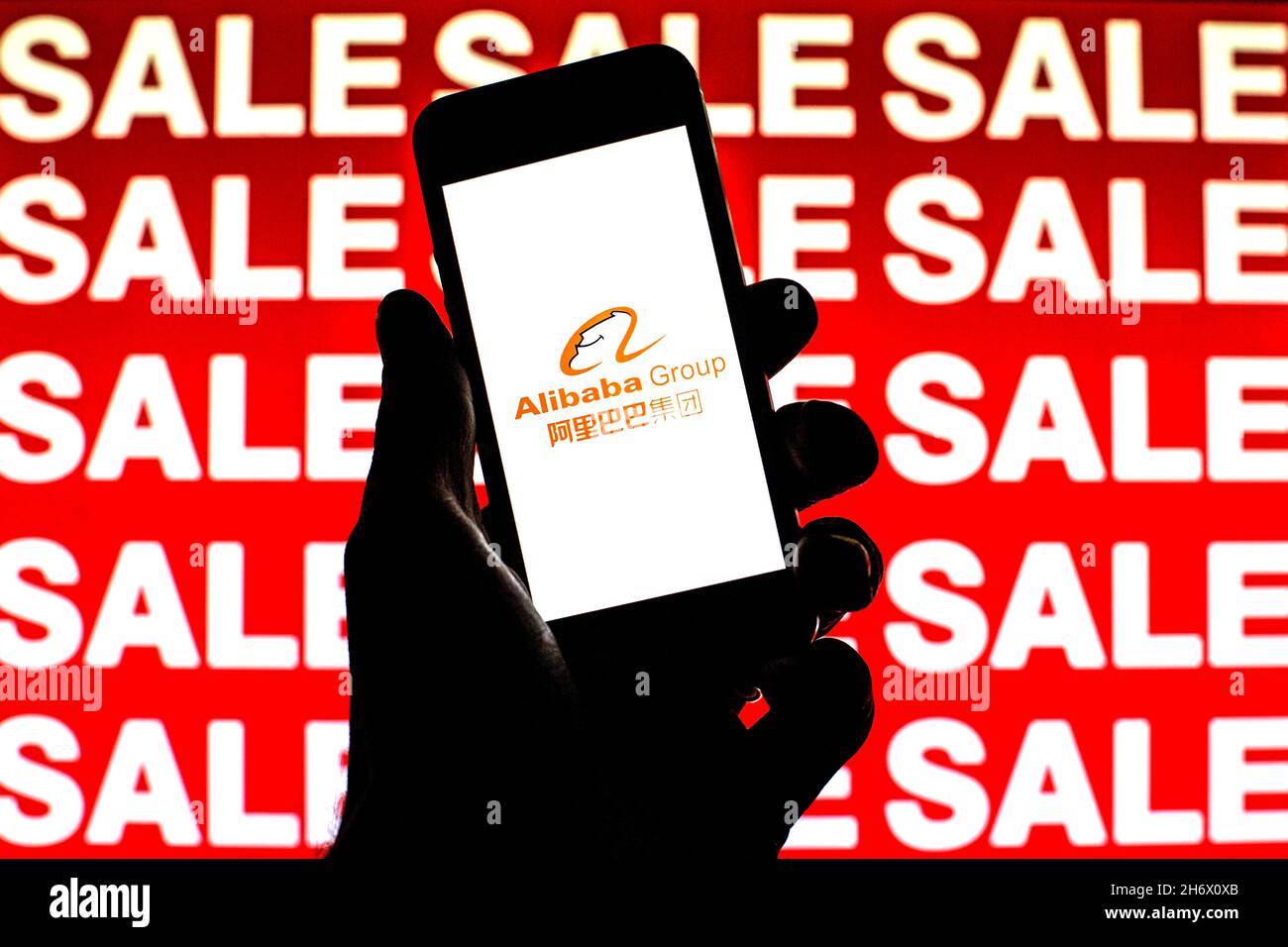 In this photo illustration, an Alibaba Group logo is seen on a ...