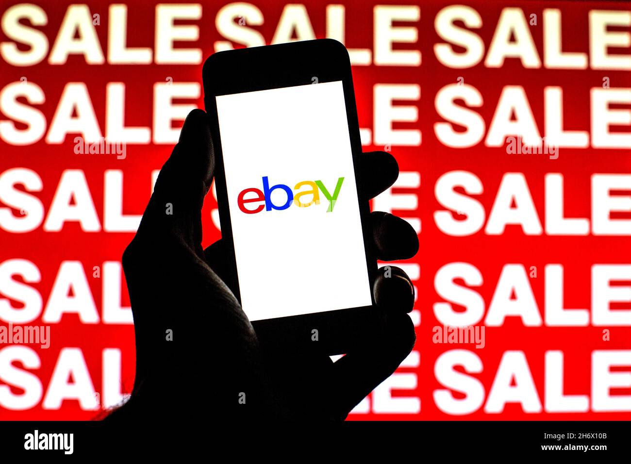 In this photo illustration, an eBay logo is seen on a smartphone screen ...