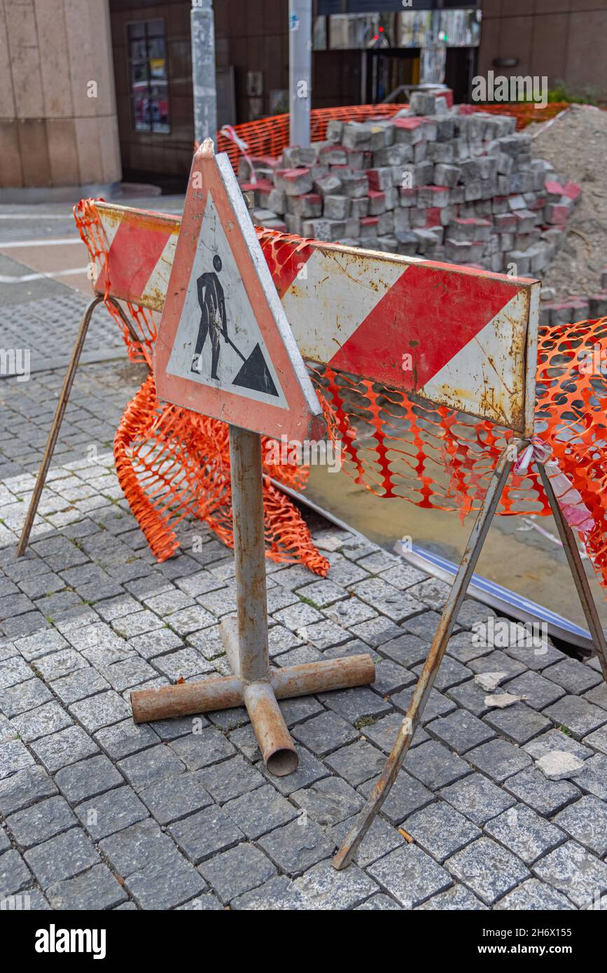 Road Works Sign Construction Barrier at City Street Stock Photo - Alamy