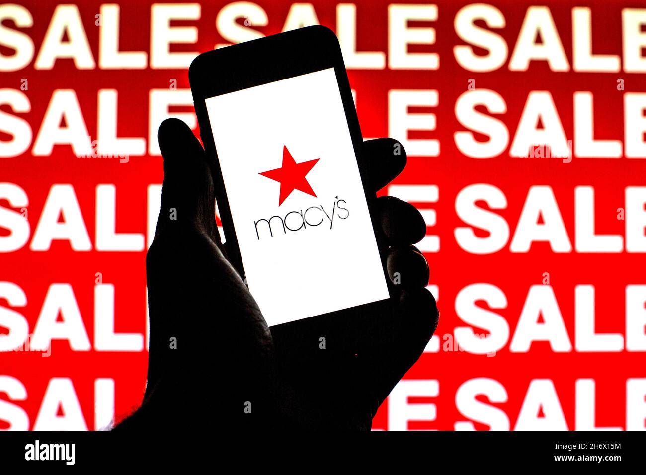 In this photo illustration, a Macy's logo is seen on a smartphone ...