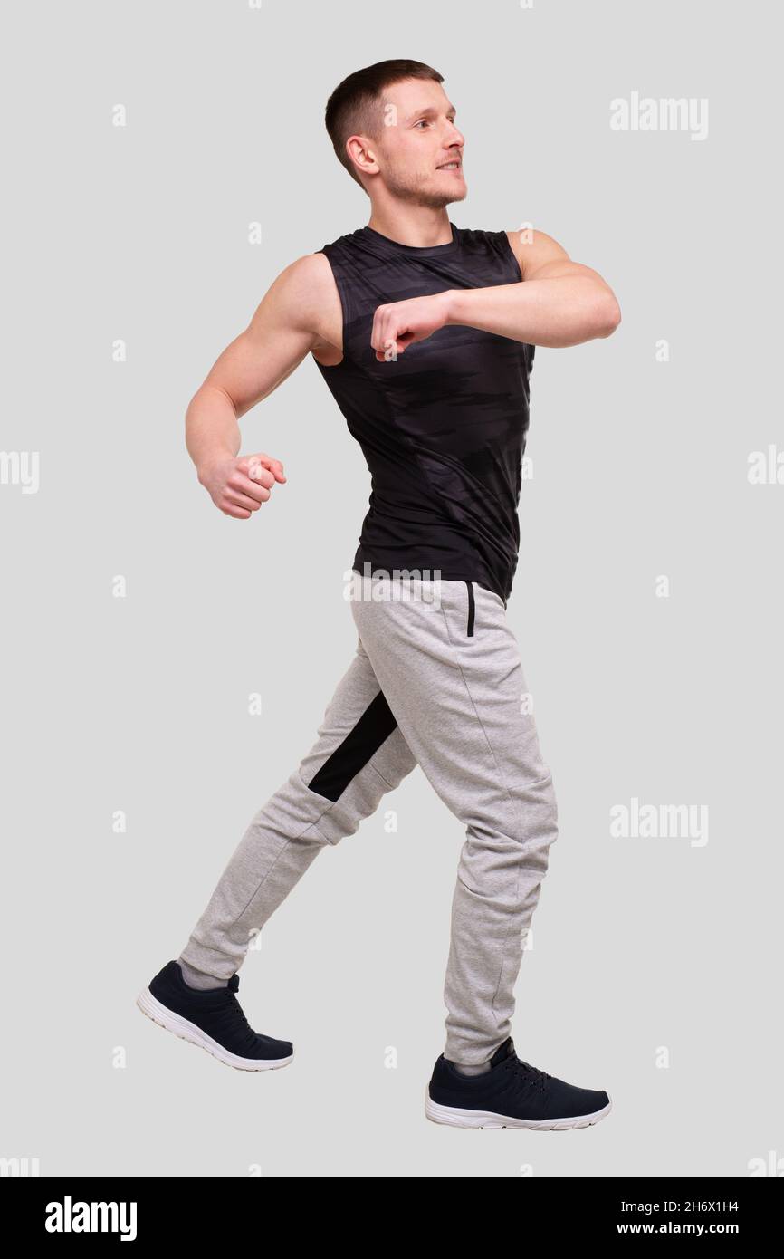 Sport man Warming Up. Pre workout Warm up. Man Doing Excersises ...