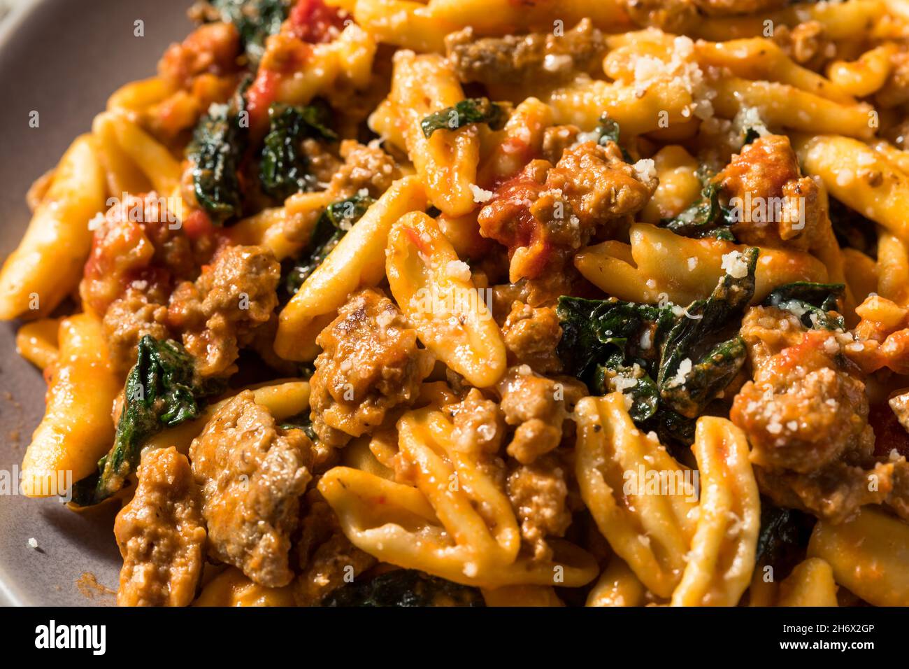 Homemade Cavatelli Pasta Dinner with Sausage and Spinach Stock Photo ...