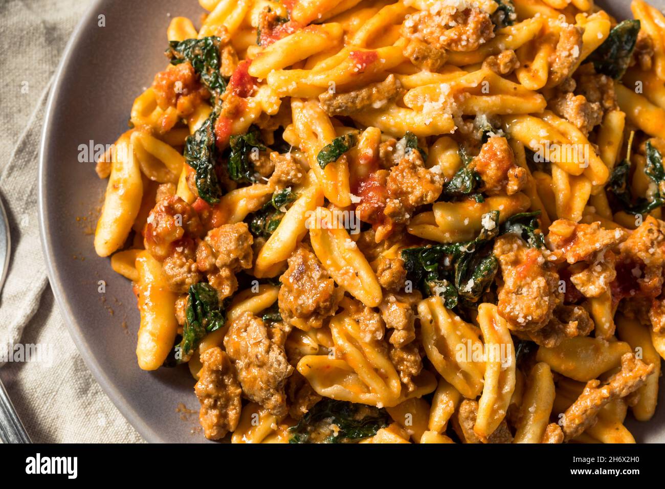 Homemade Cavatelli Pasta Dinner with Sausage and Spinach Stock Photo ...