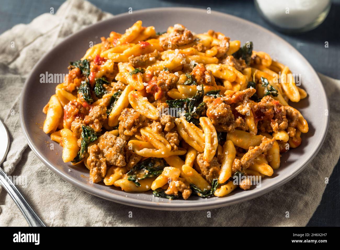 Homemade Cavatelli Pasta Dinner with Sausage and Spinach Stock Photo ...