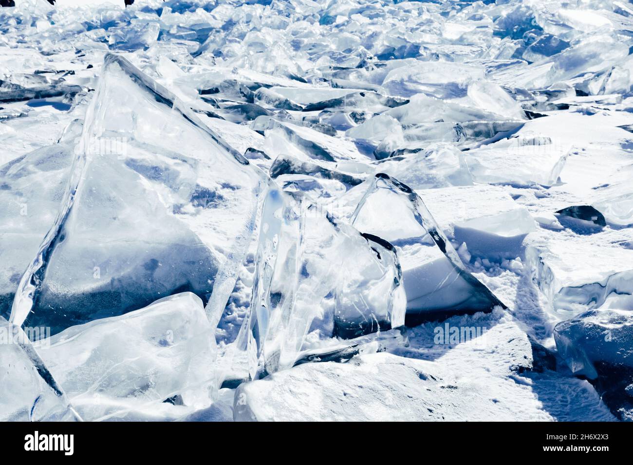 Blocks of ice gleaming in the sun. Arctic winter background. Winter ice ...