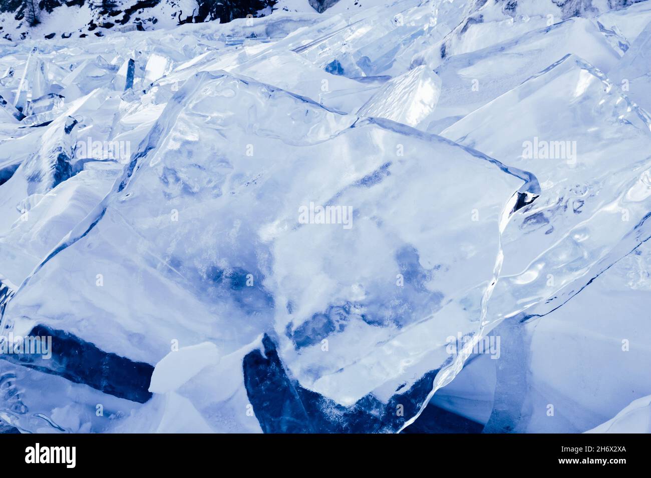 Blocks of ice gleaming in the sun. Arctic winter background. Winter ice ...