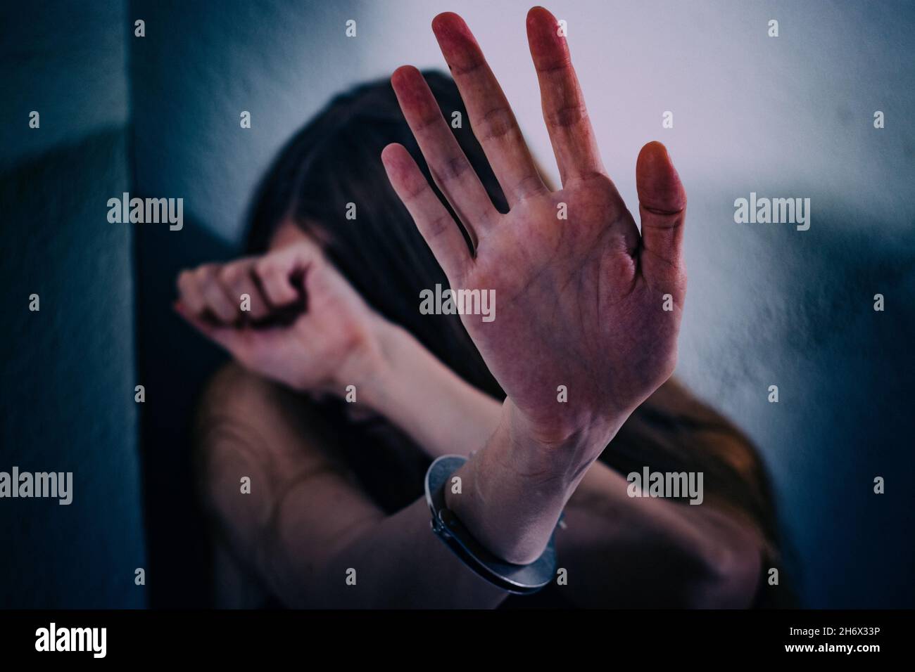Woman with handcuffs hi-res stock photography and images - Alamy