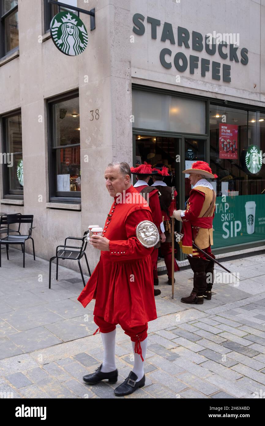 Ceremonial soldiers queue for coffee at Starbucks before joning the ...
