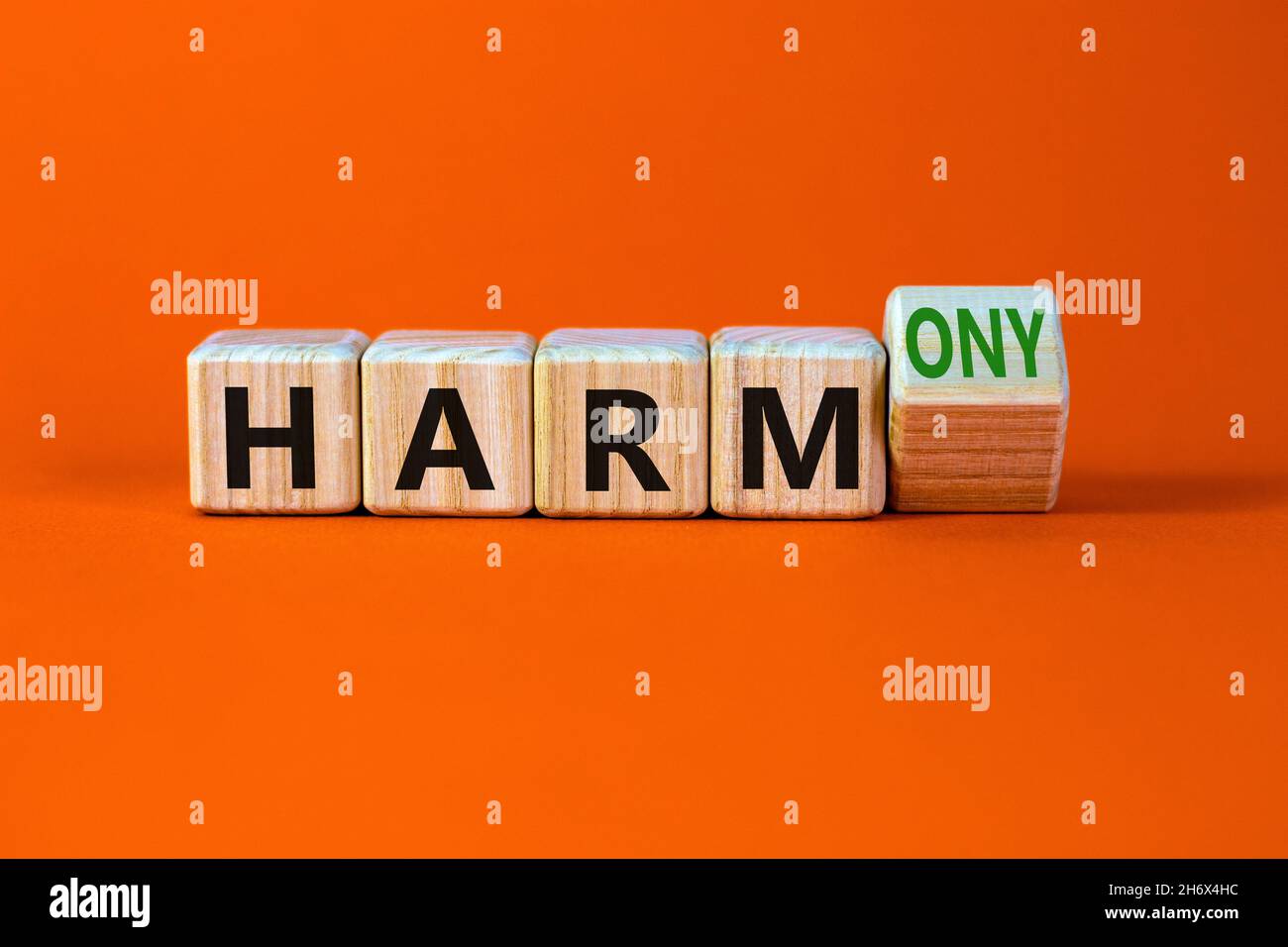 From harm to harmony. Turned a wooden cube and changed word harm to ...