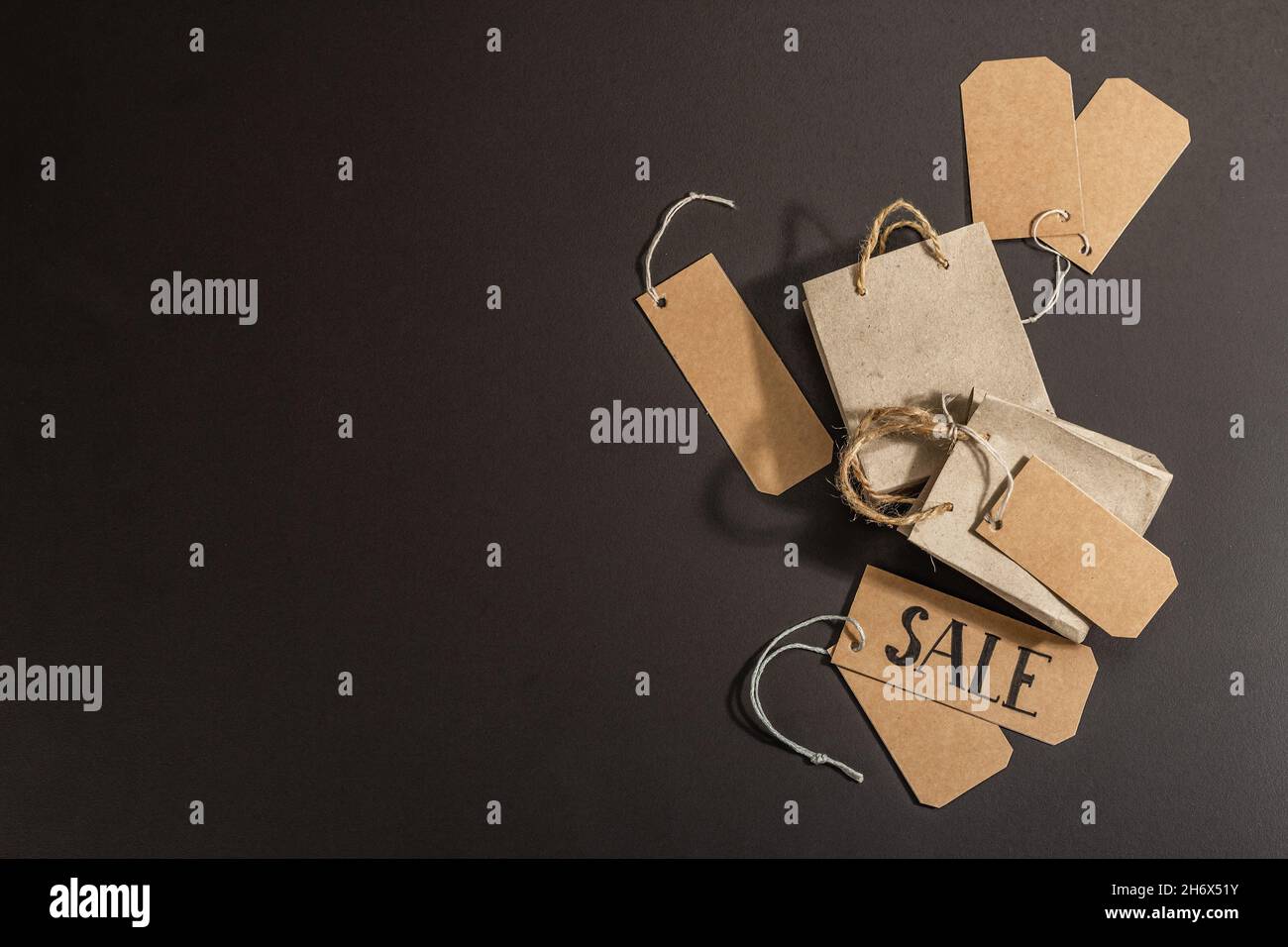 Black Friday Sale concept. Shopping paper bags, handmade tags. Black ...