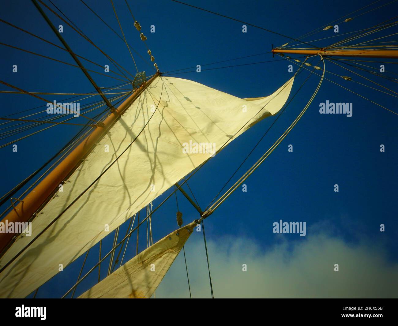 Pull up the sails on an old sailing ship Stock Photo - Alamy
