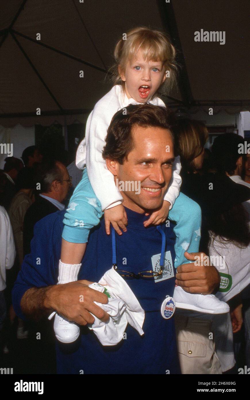 Gregory Harrison and daughter Emma Harrison attend the 1990 Permanent ...