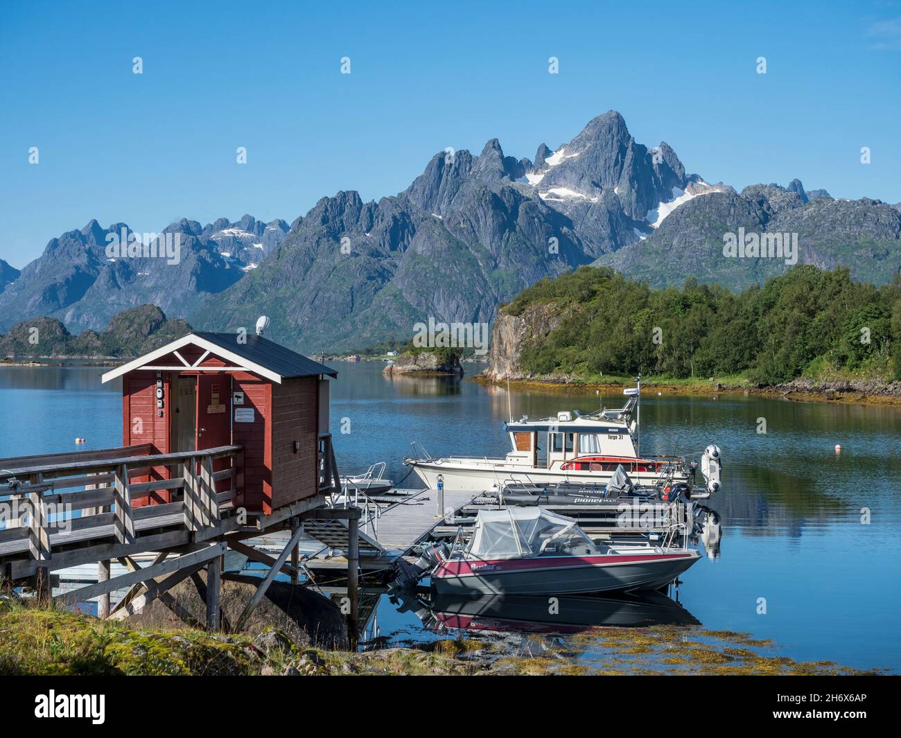 Little marina at the Tennfjord, branch of Raftfjord visible in the back ...