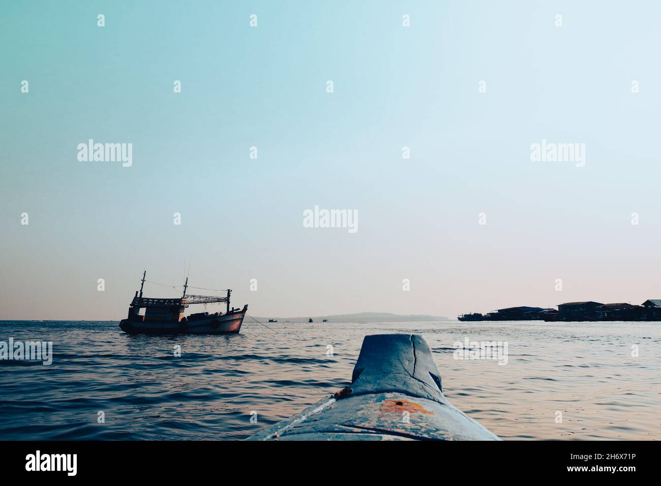 Scenic view from a kayak boat looking out to the wide open sea and ...