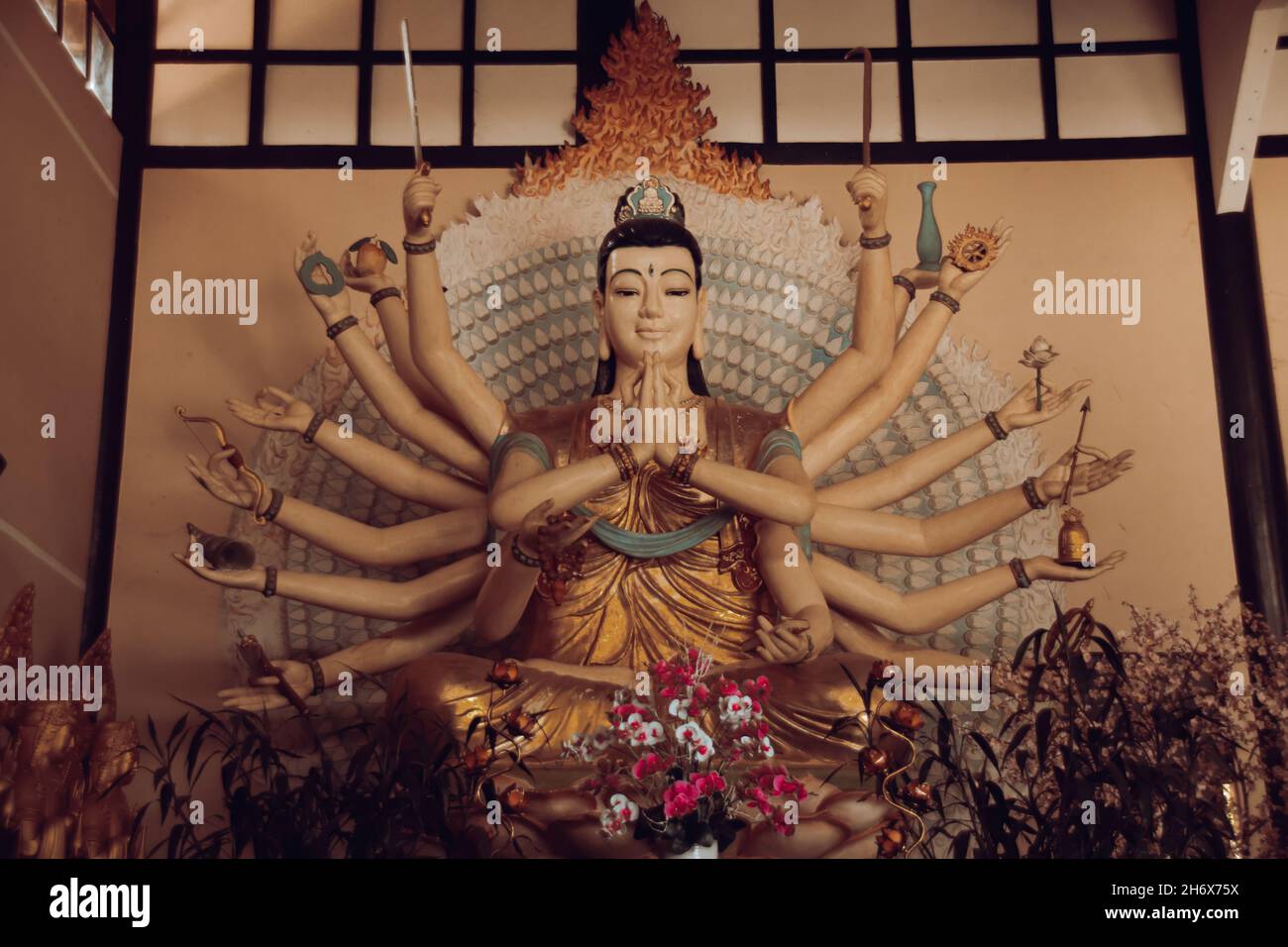 Statue of the Avalokiteshvara or Buddha with many arms inside Linh An ...