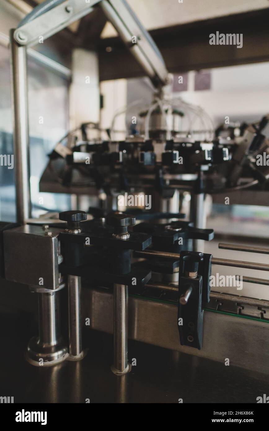 Automatic monoblock wine filling machine at wine factory Stock Photo ...