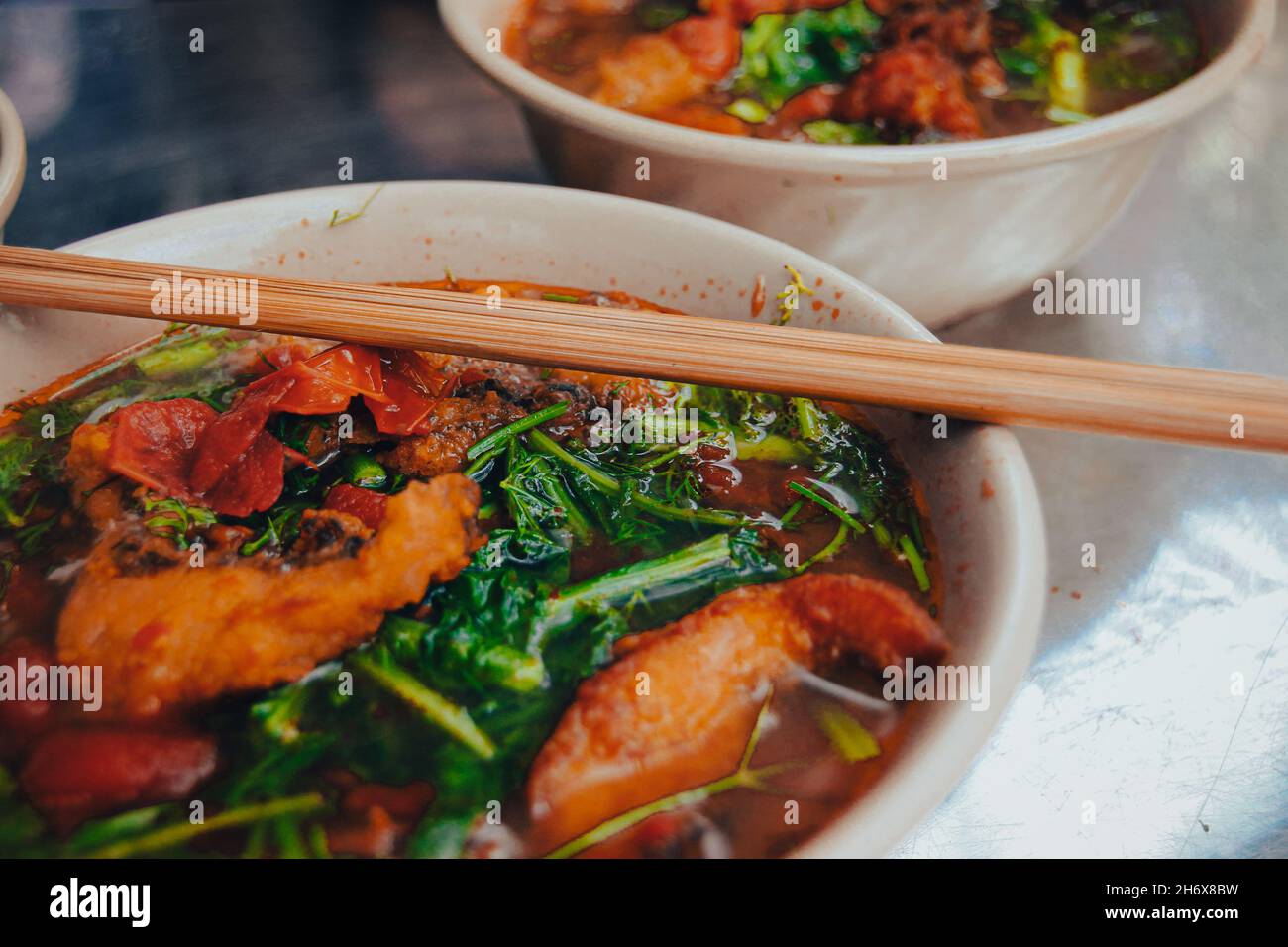 Vietnamese Fried Fish Vermicelli Noodle Soup (Bun Ca), a traditional ...