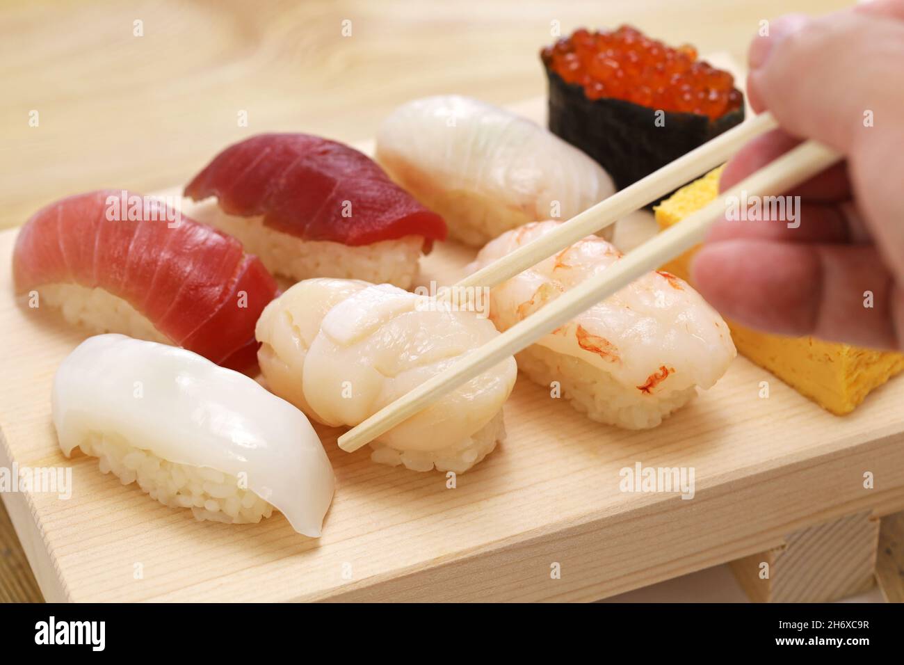 Japanese sushi on wooden board called "Geta Stock Photo - Alamy