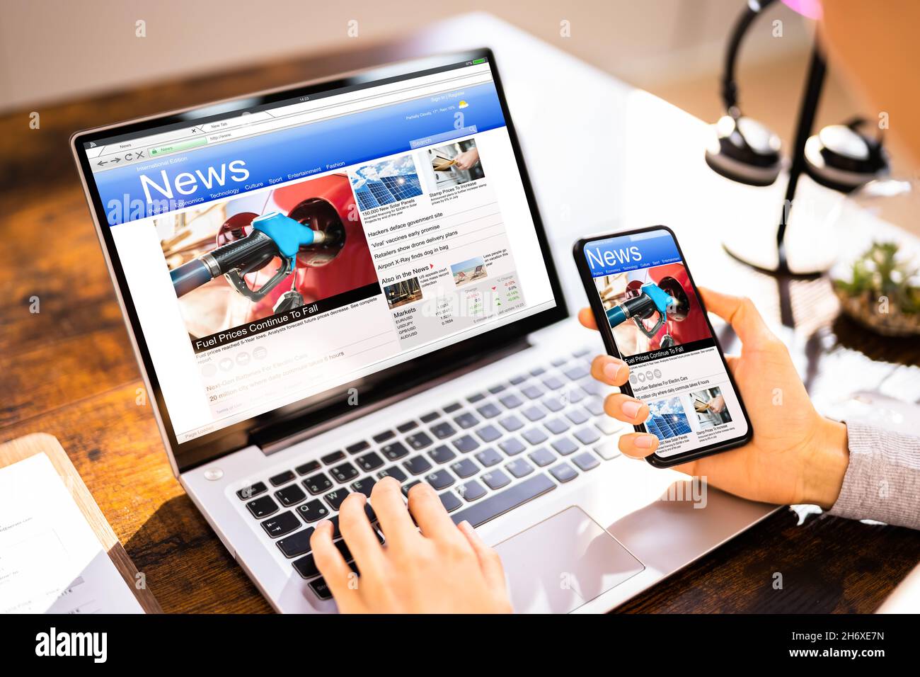 African american girl reading newspaper hi-res stock photography and ...
