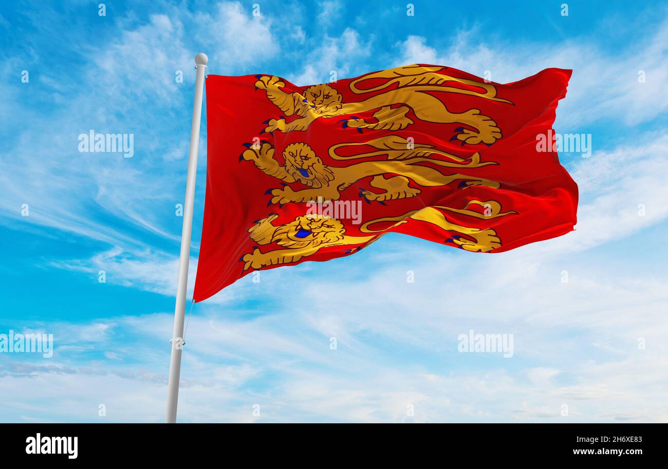 flag of Haute Normandie, France at cloudy sky background on sunset ...