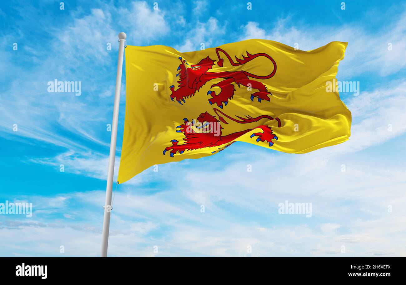 flag of Hautes Pyrenees, France at cloudy sky background on sunset ...