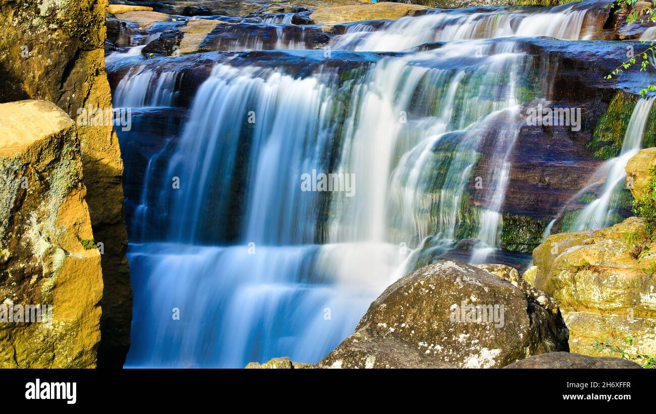 Beautiful view of a river flows over rocks Stock Photo - Alamy