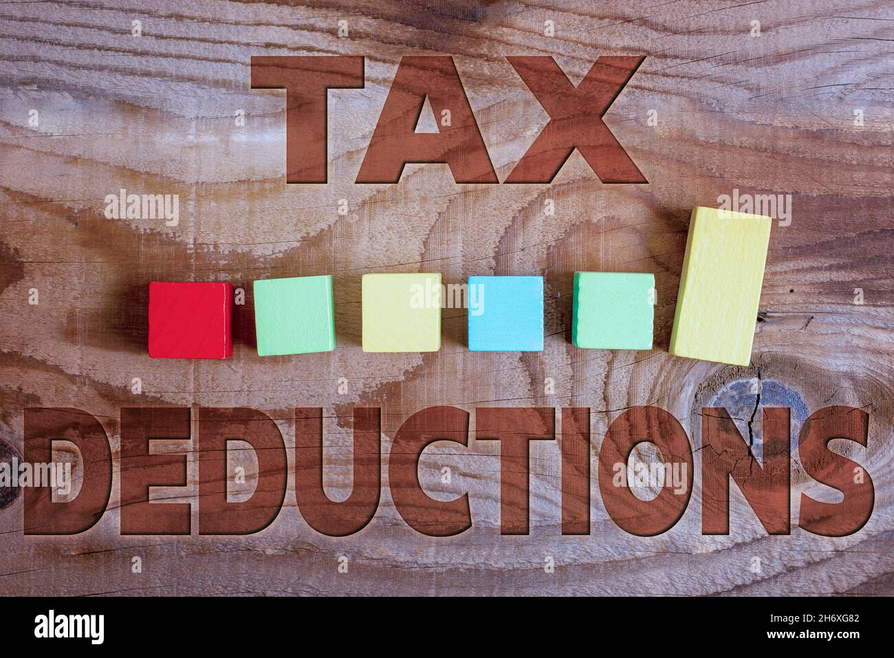 Text showing inspiration Tax Deductions. Word Written on reduction ...