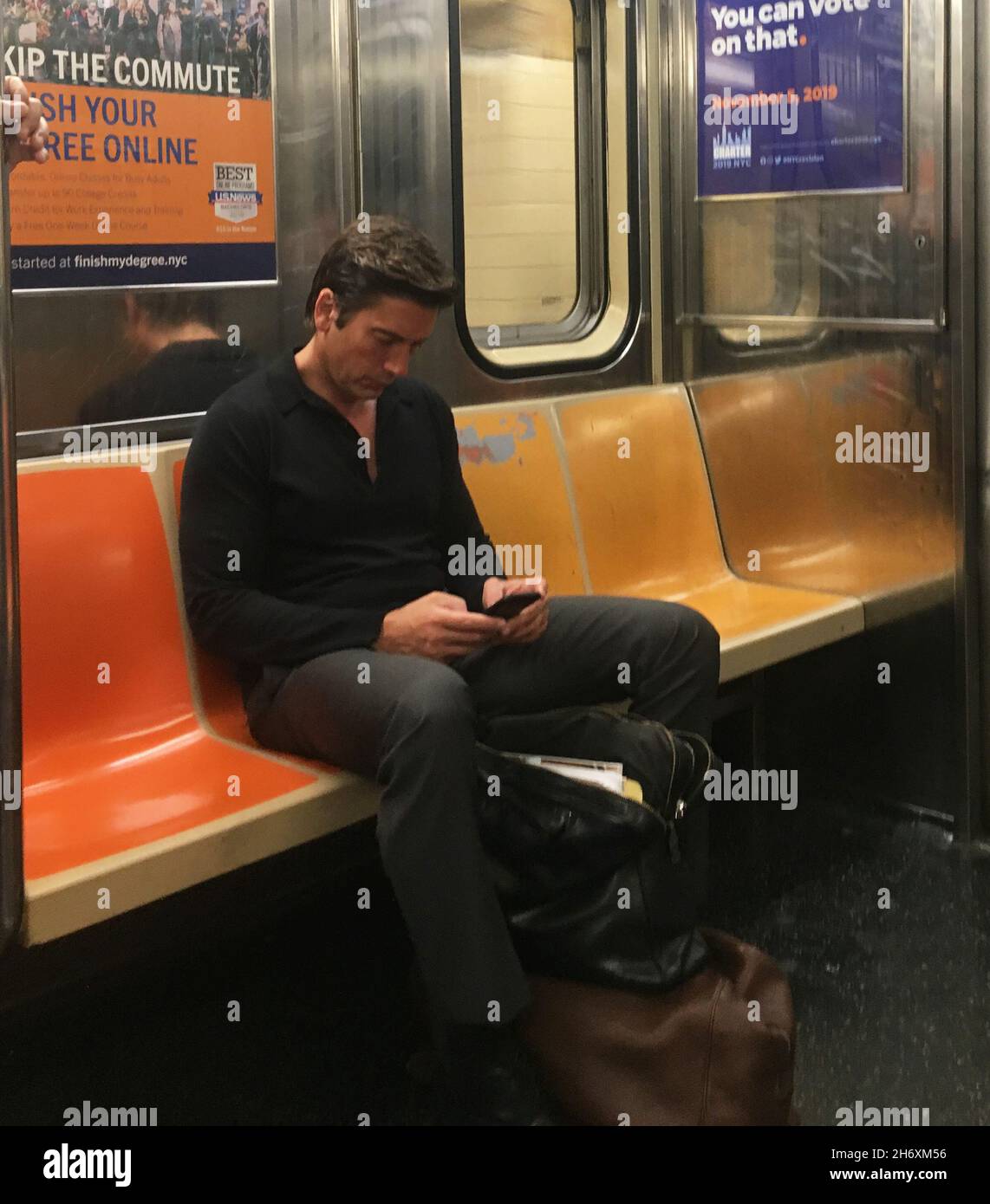 New York - NY - 10/09/19 - David Muir manspreading on the subway after ...