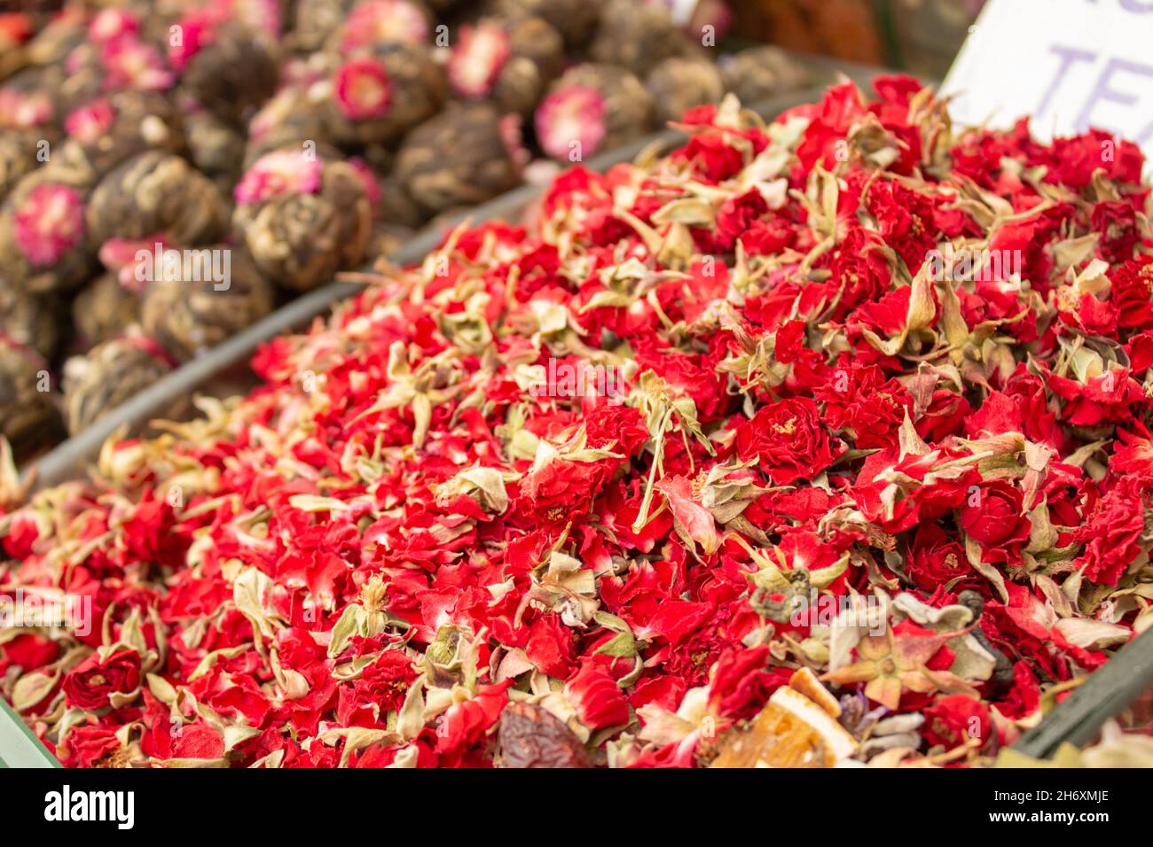 Exotic floral red rose tea at spice stall. Souvenir market shopping ...