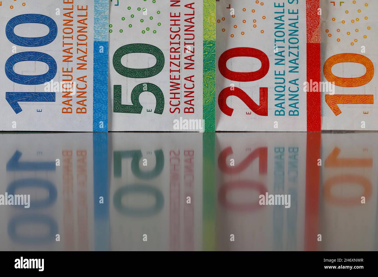 Here are four of six new Swiss banknotes of various denominations ...