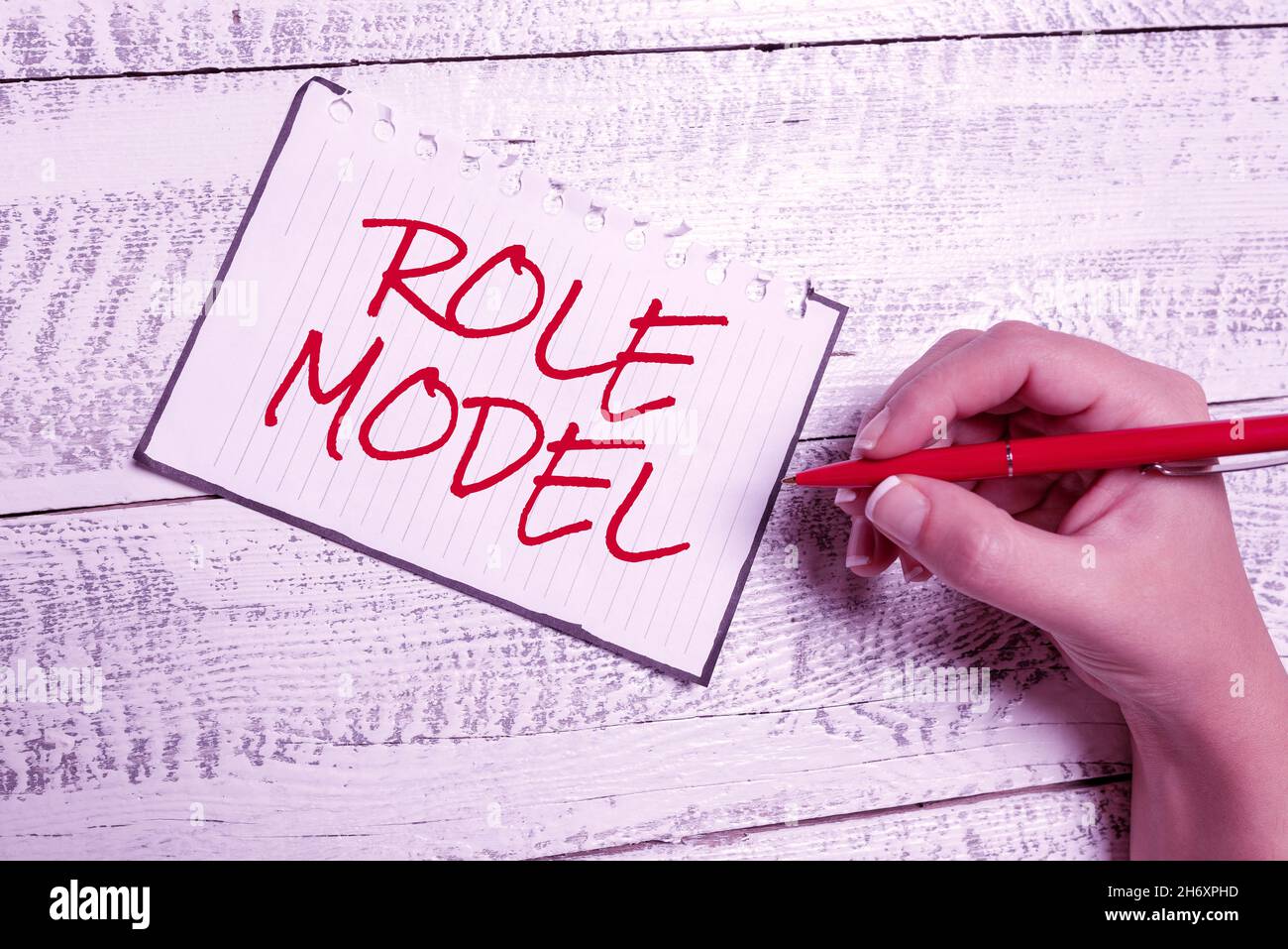 Hand writing sign Role Model. Business approach a person looked to by ...