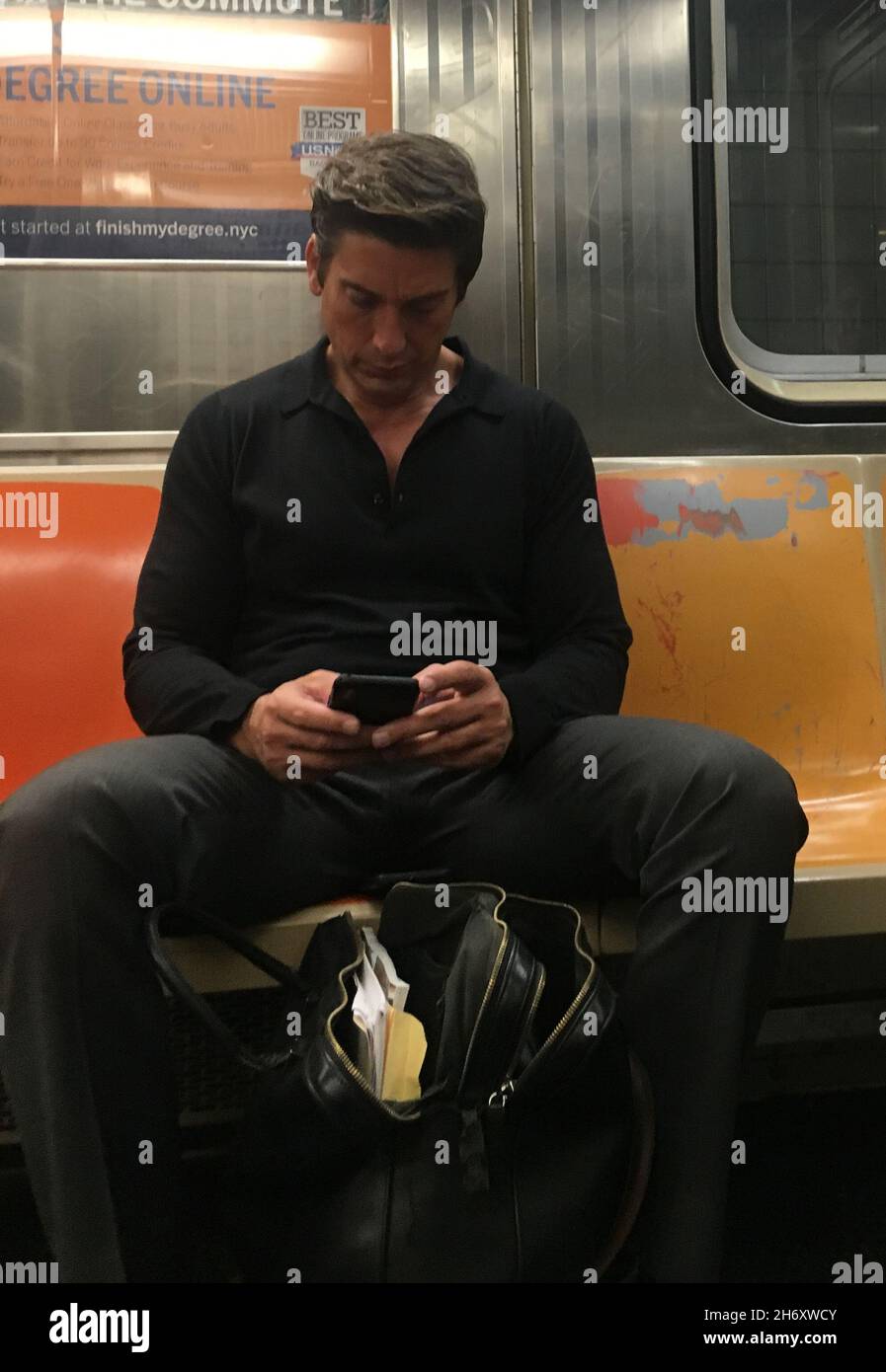 New York - NY - 10/09/19 - David Muir manspreading on the subway after ...