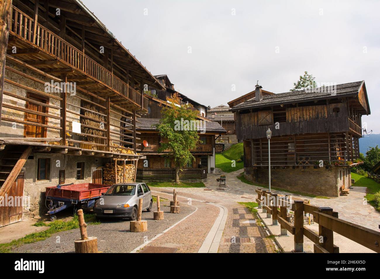 Traditional wooden buildings in the Alpine village of Sauris di Sopra ...